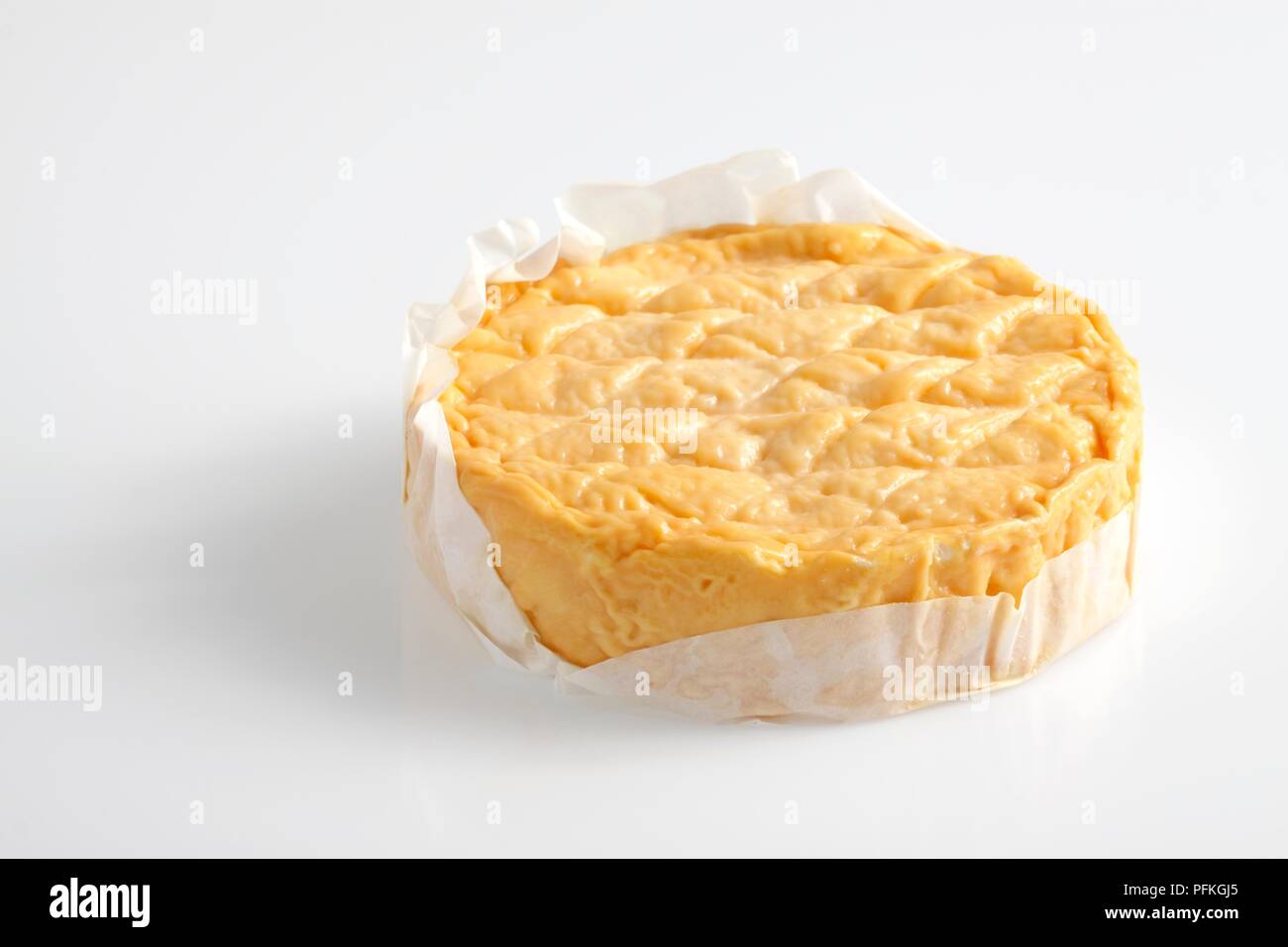 Round of Epoisses de Bourgogne AOC cow's milk cheese wrapped in wax ...