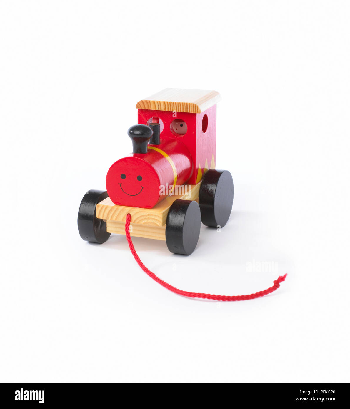 Toy train on string Stock Photo - Alamy