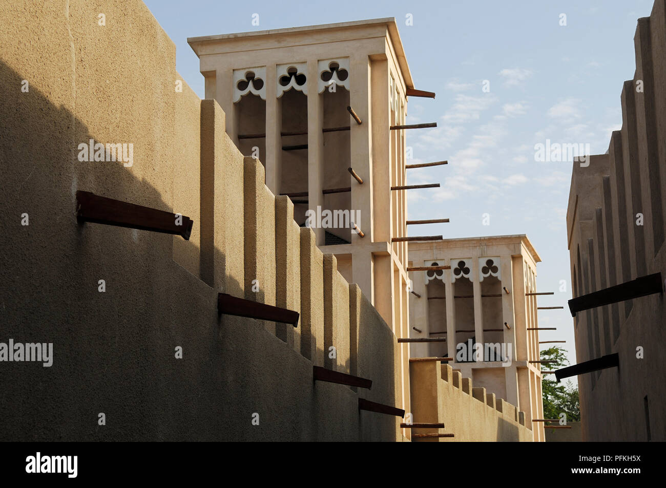 United Arab Emirates, Dubai, traditional wind towers and narrow windows ...