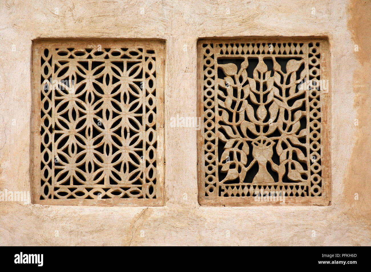 United Arab Emirates, Dubai, intricate stonework window on house in ...