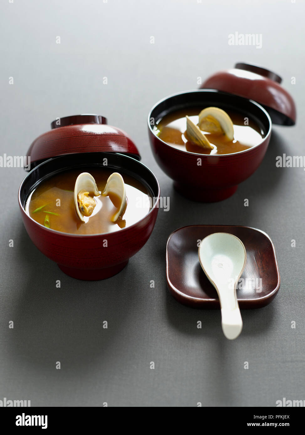 Asari no miso-shiru, bowls of clam miso soup, with spoon Stock Photo ...