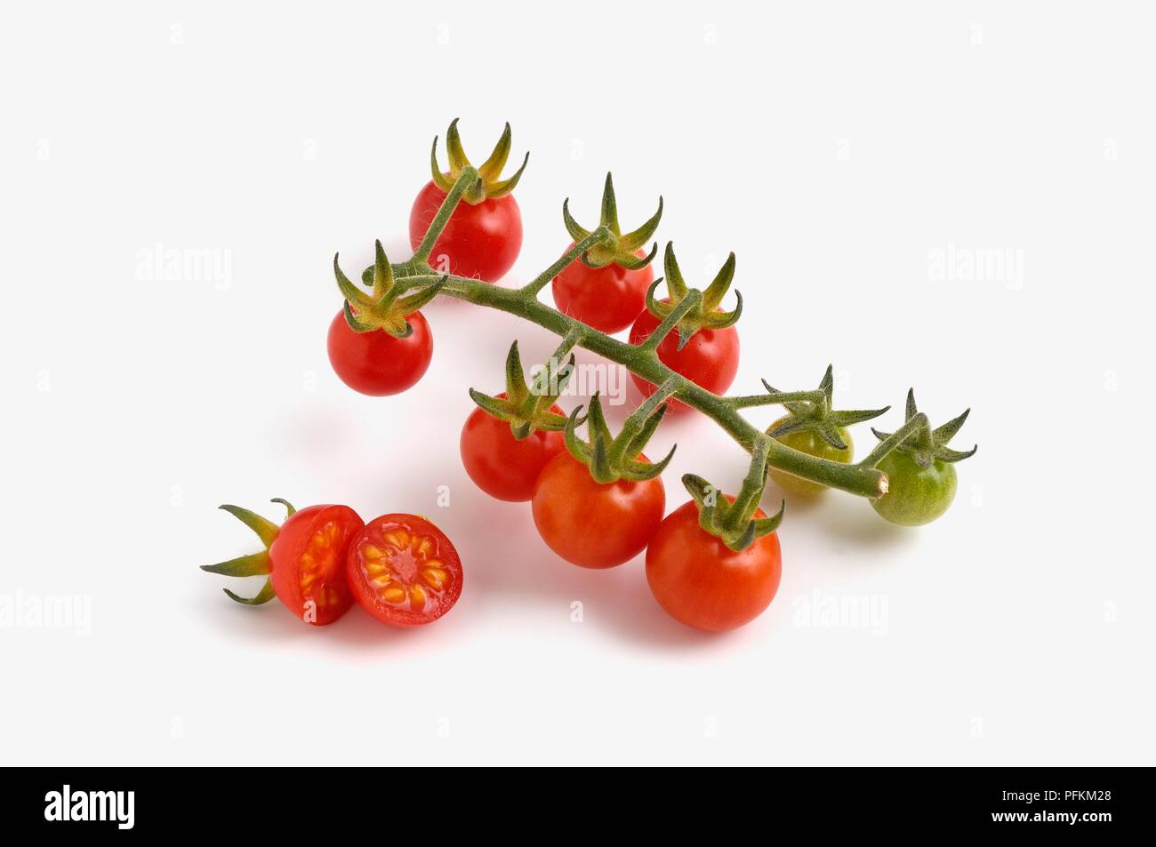 Whole and sliced Mexican Matt's Wild Cherry tomatoes Stock Photo - Alamy