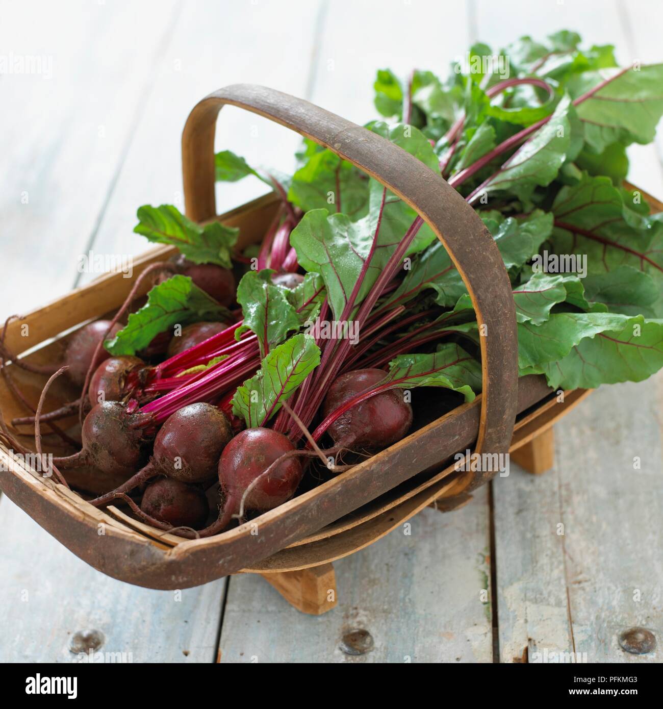 Raw beetroot in basket Stock Photo - Alamy