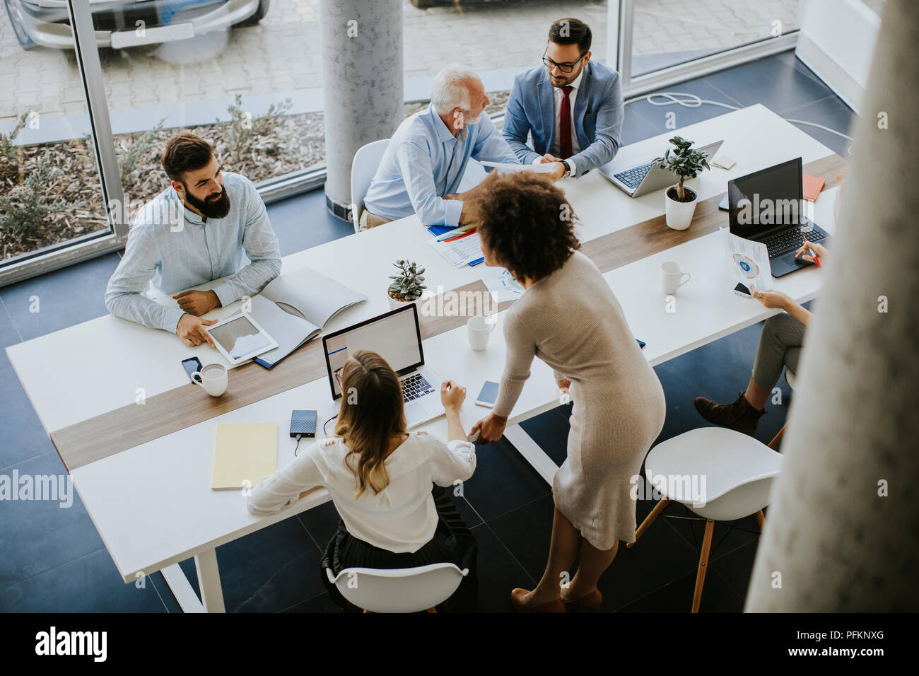 Top view at business people working in office Stock Photo - Alamy