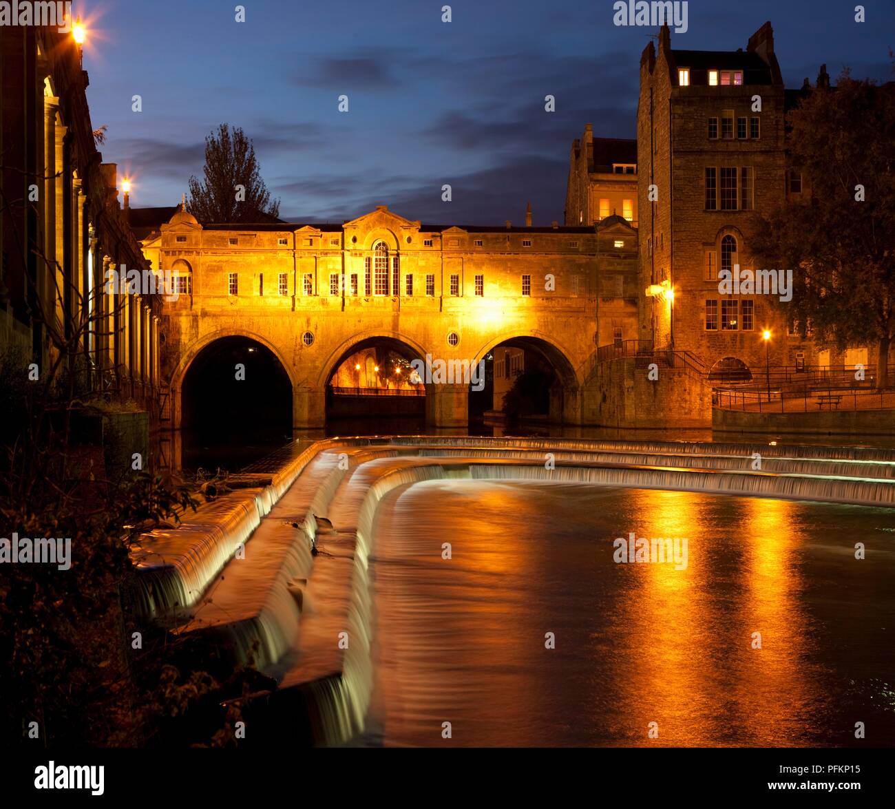 Great Britain, England, Somerset, Bath, Pulteney Bridge with waterfall ...
