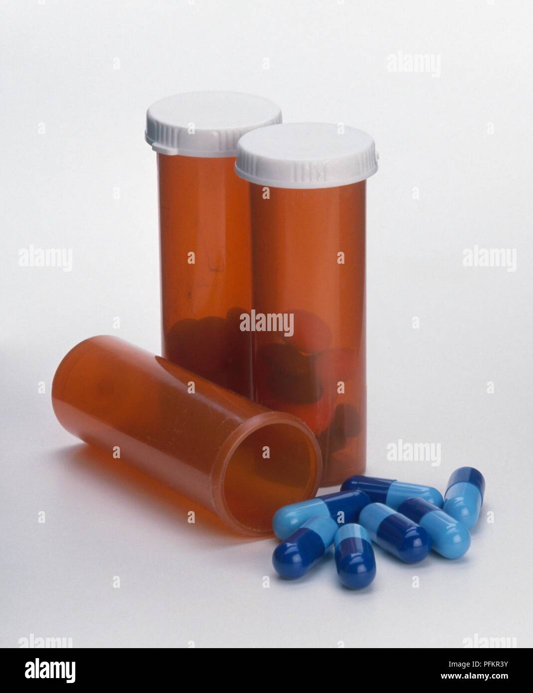 Plastic pill bottles and capsules Stock Photo - Alamy