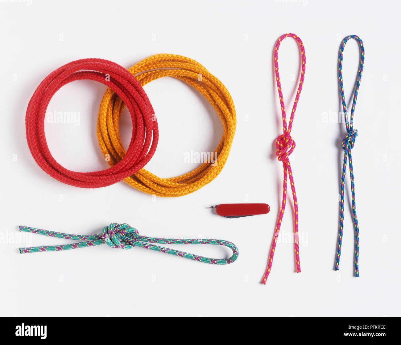 Five lengths of colourful looped ropes and a small army knife, view ...