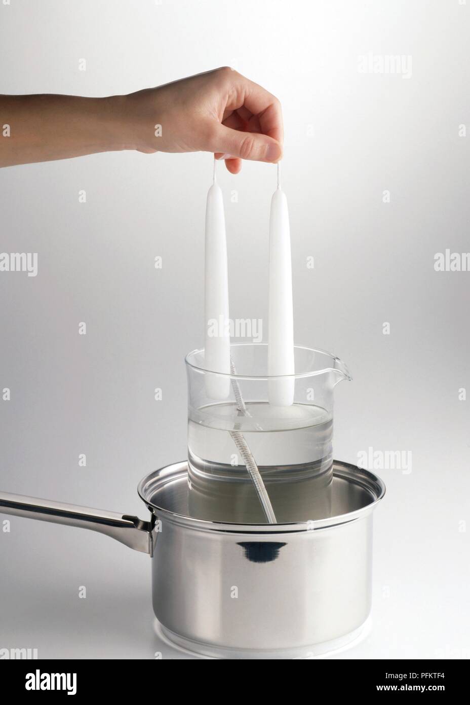 Human hand dipping hi-res stock photography and images - Alamy