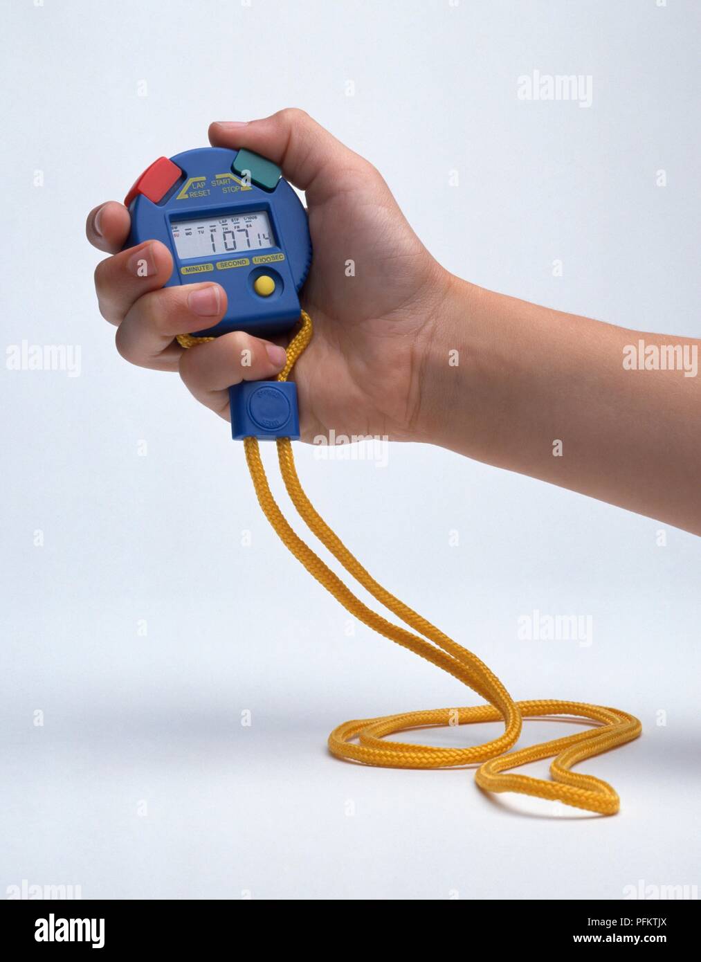 Child's hand holding stopwatch Stock Photo - Alamy