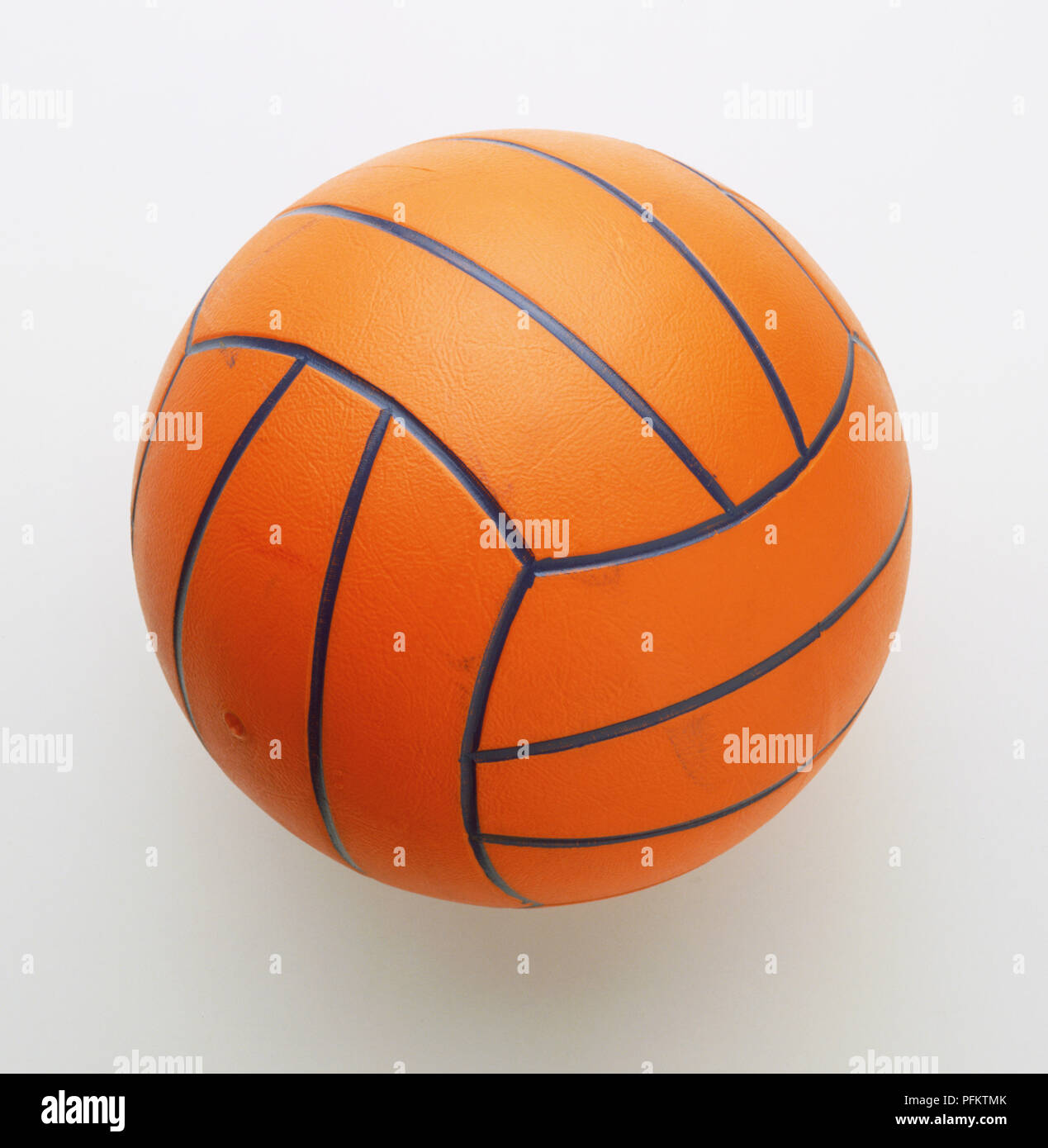 Orange coloured volley ball Stock Photo - Alamy