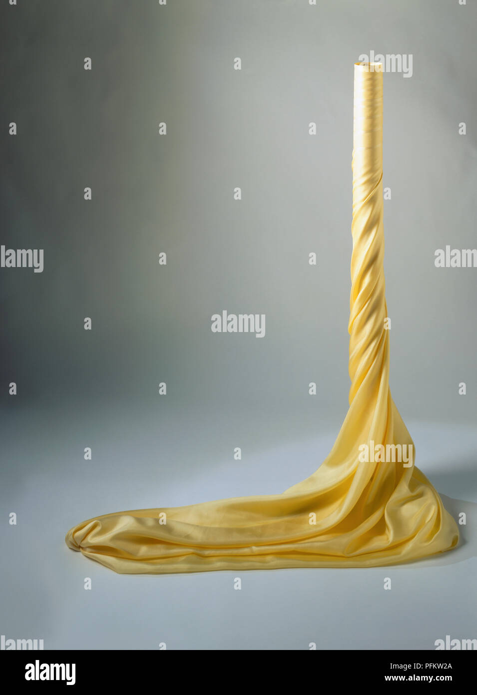 A roll of yellow silk Stock Photo - Alamy