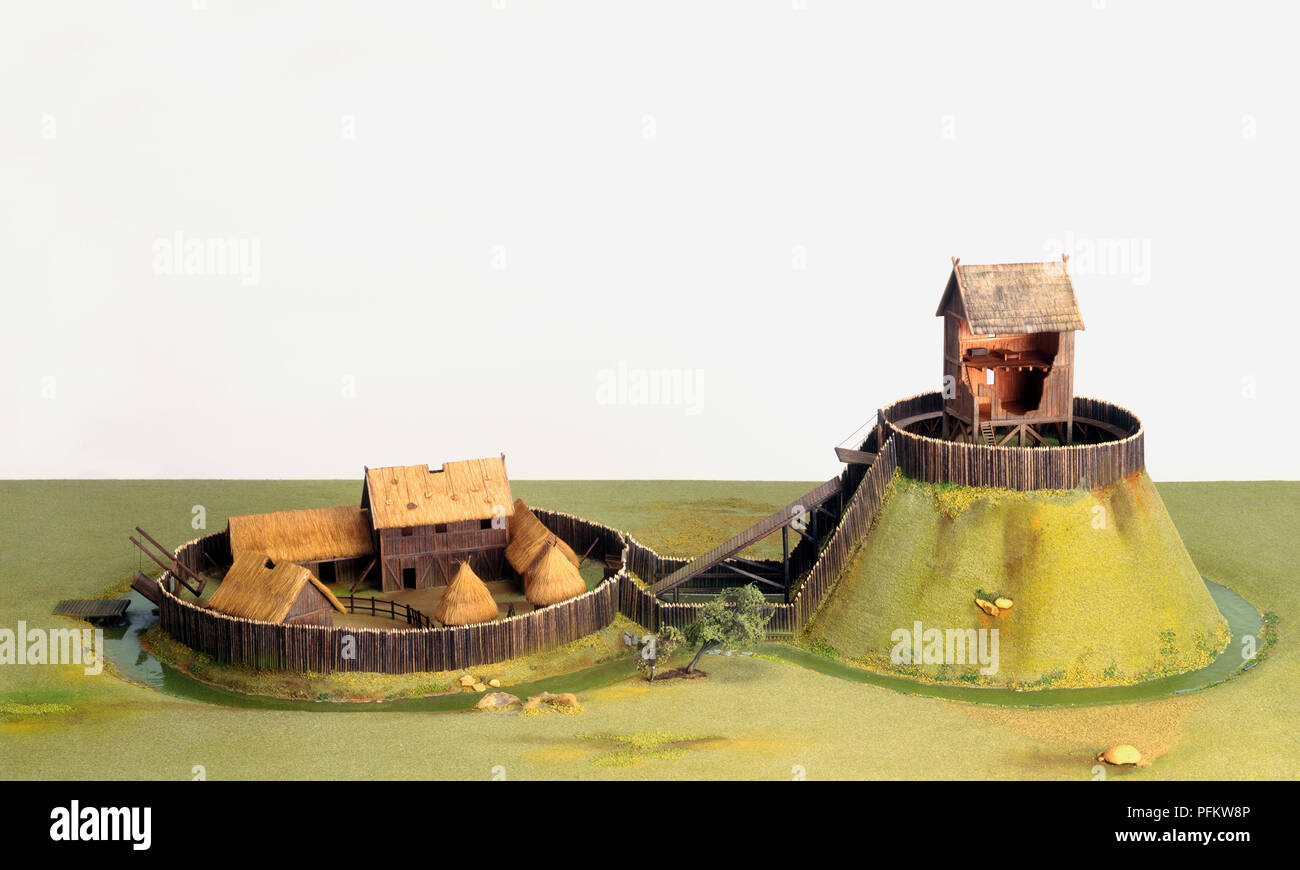 Model of Motte and bailey castle surrounded by wood fence and moat ...