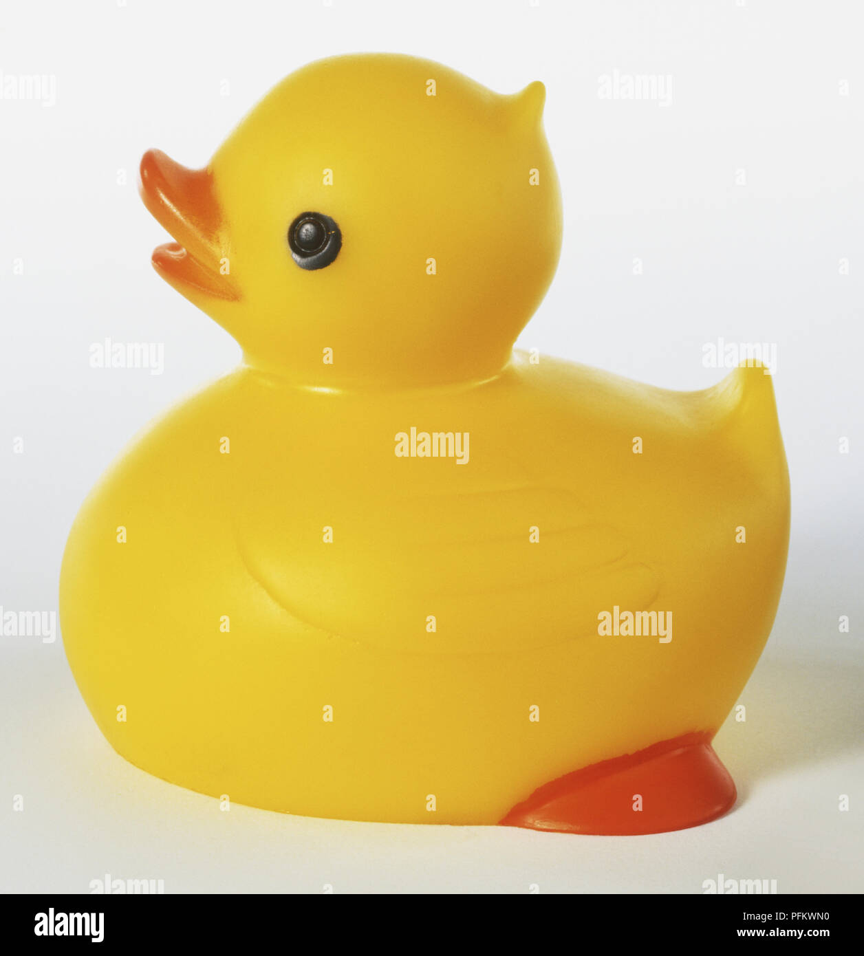 Yellow plastic duck, side view Stock Photo - Alamy