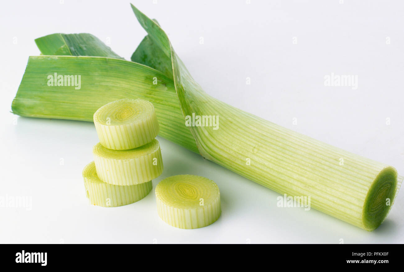 Whole leek without root showing cross section, and slices Stock Photo ...