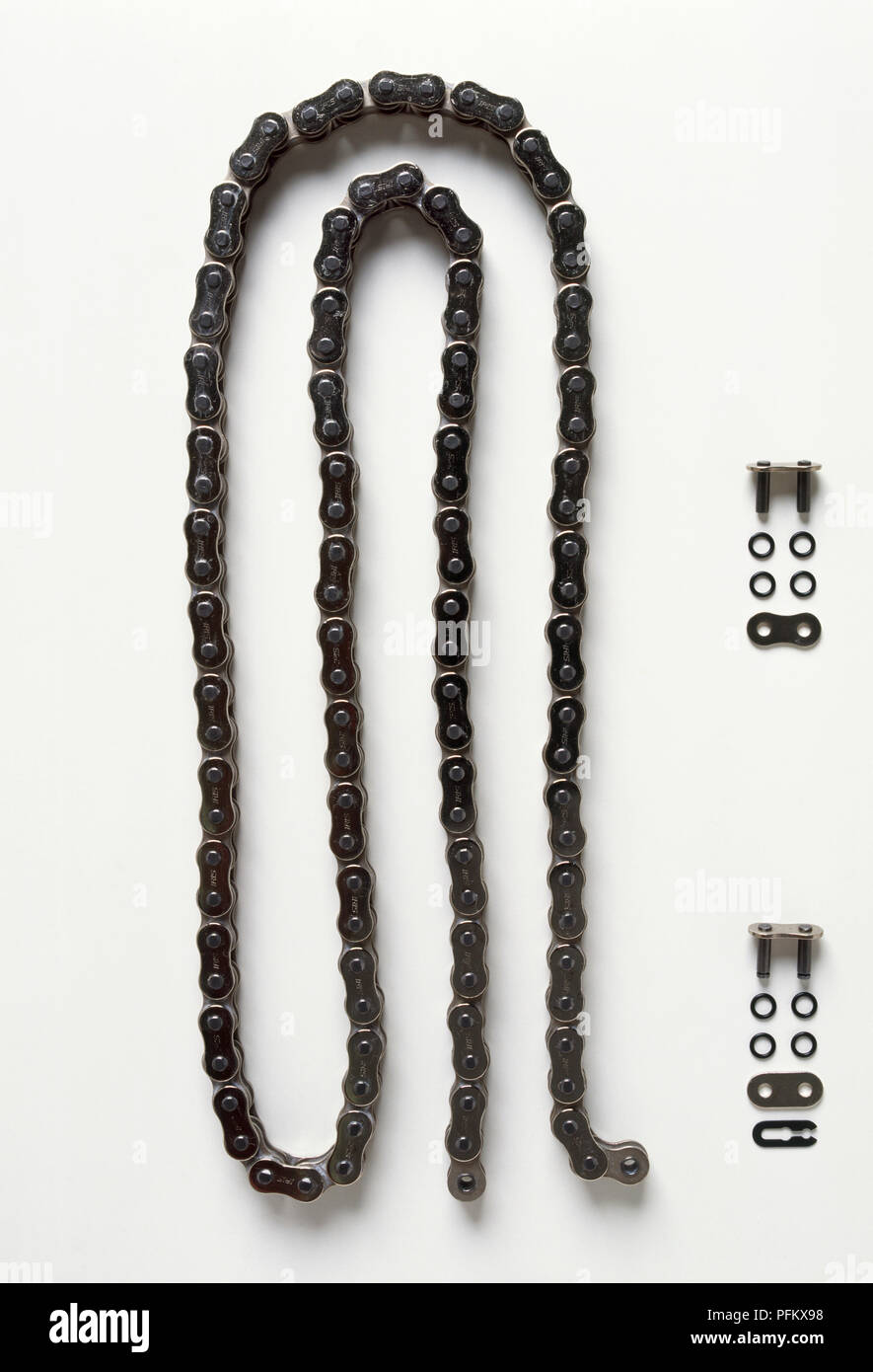 Motorcycle chain and components of split link Stock Photo - Alamy