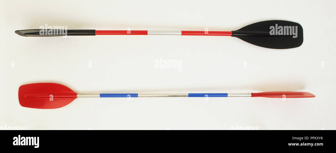 Two colourful paddles Stock Photo - Alamy