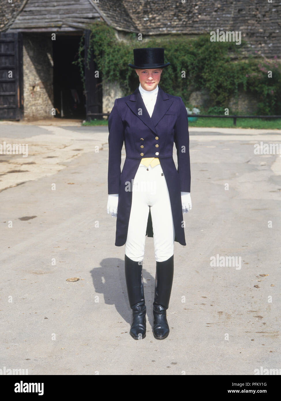 Young woman wearing dressage clothing Stock Photo - Alamy