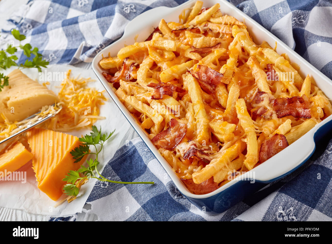 australian fries smothered in melted mix of shredded cheese and bacon ...