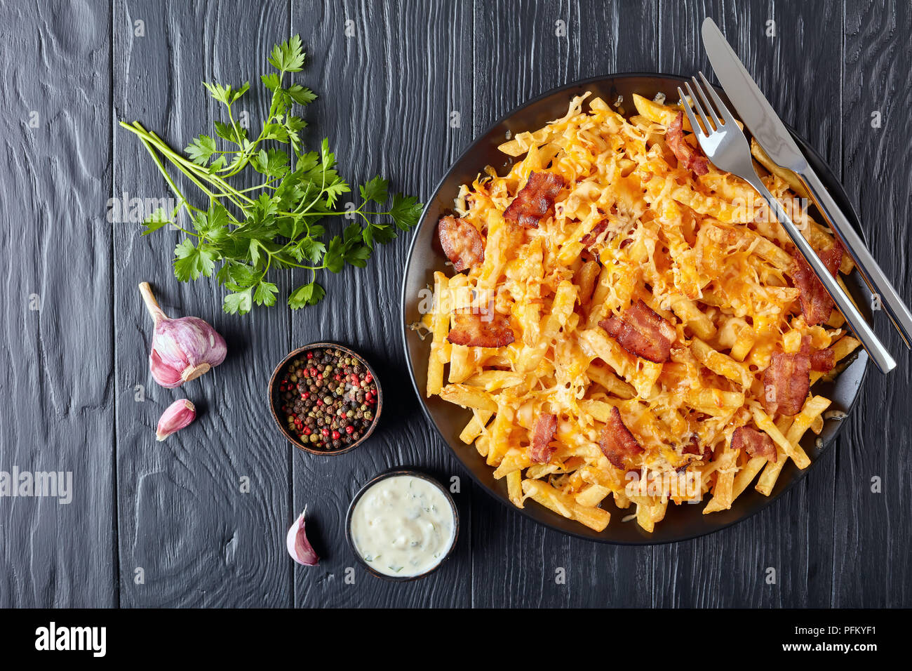 australian fries with melted mix of shredded cheese and bacon served on ...