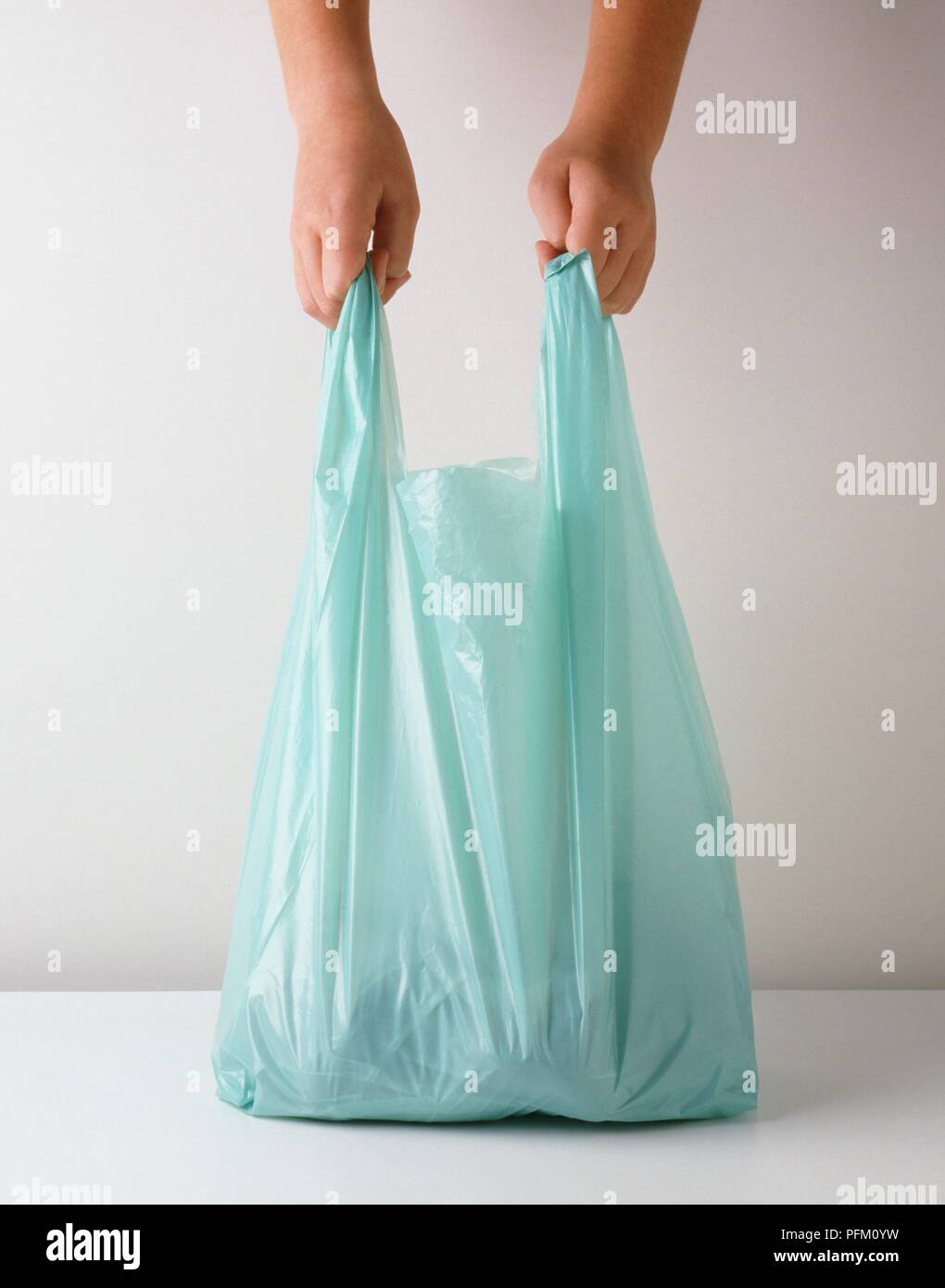 Child heavy shopping bag hi-res stock photography and images - Alamy