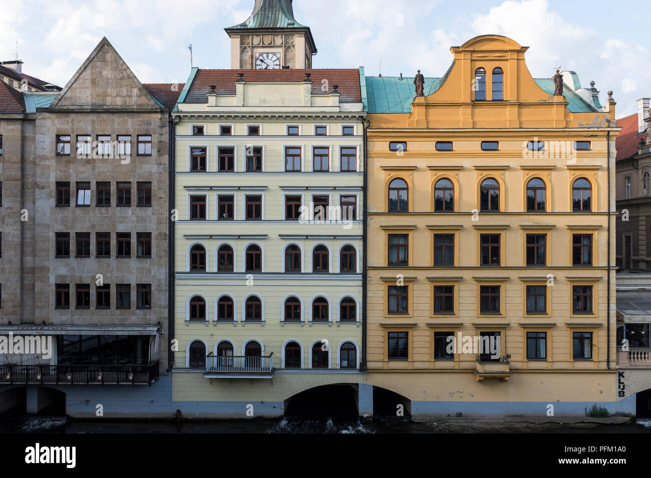 Colorful facades of buildings built over the water in Prague, Czech ...