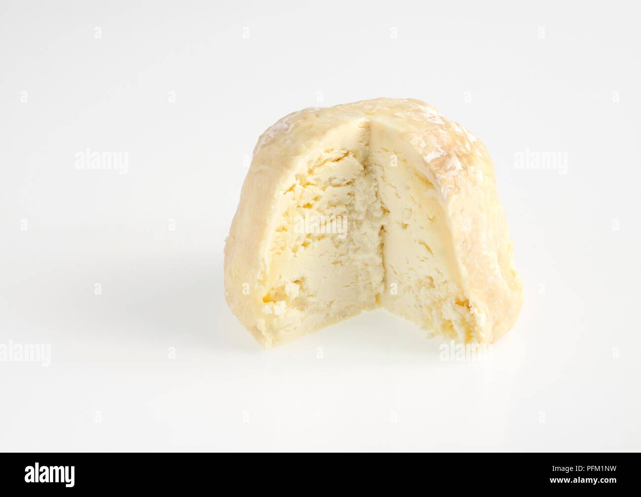 French Gaperon cow's milk cheese showing dried rind Stock Photo - Alamy