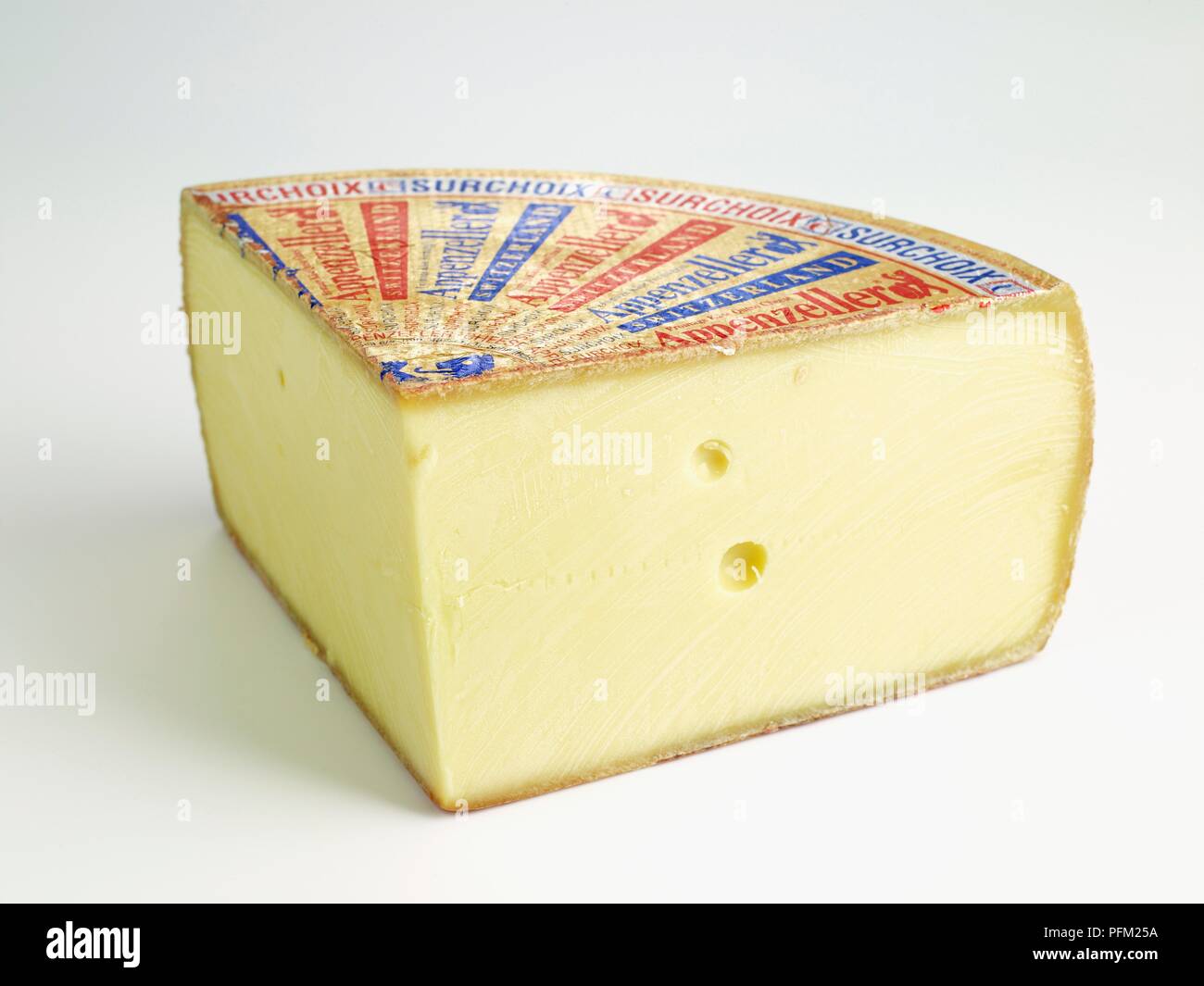 Slice of Swiss Appenzeller cow's milk cheese Stock Photo - Alamy