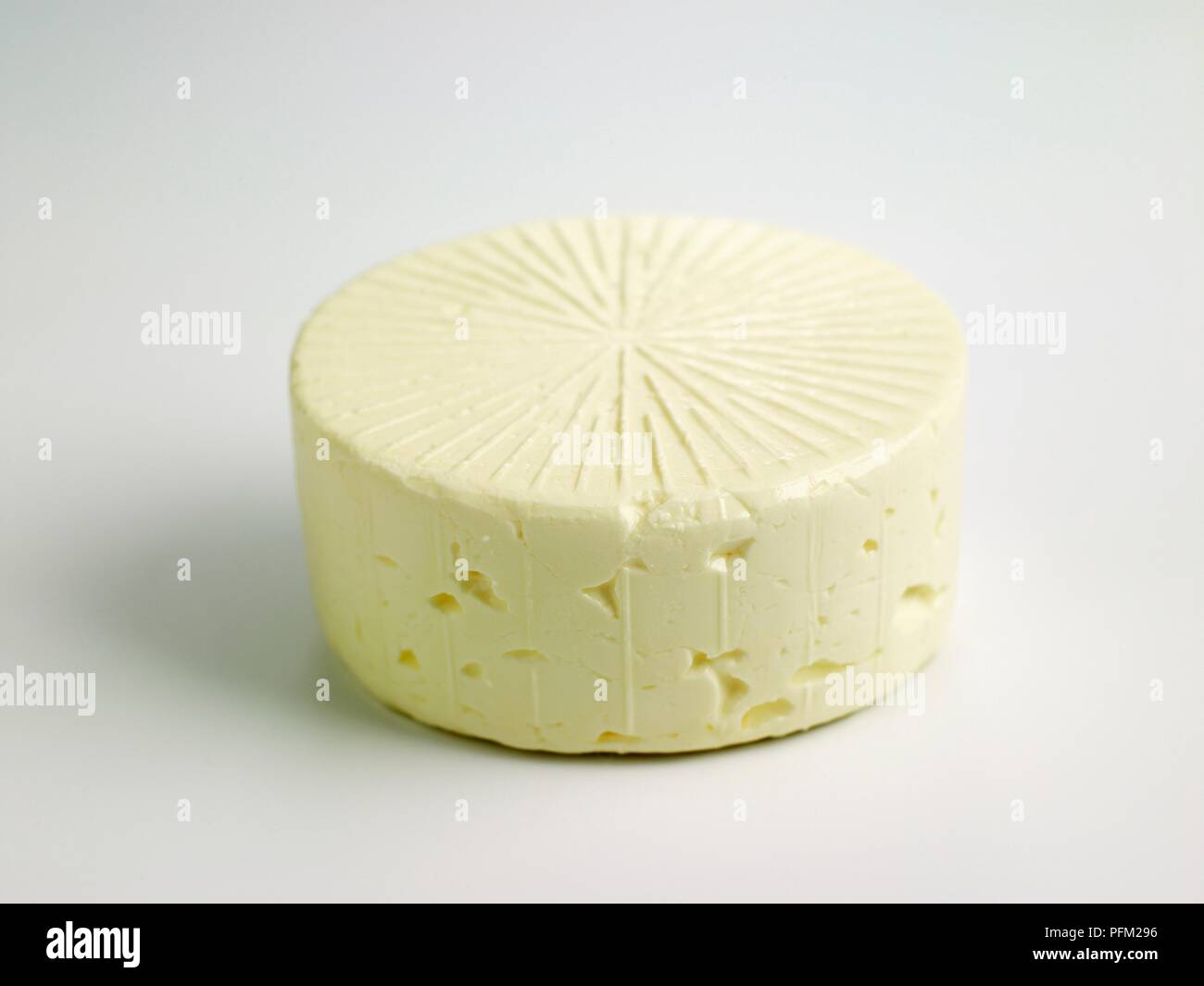 Whole round of Turkish Beyaz Peynir sheep's milk cheese Stock Photo - Alamy