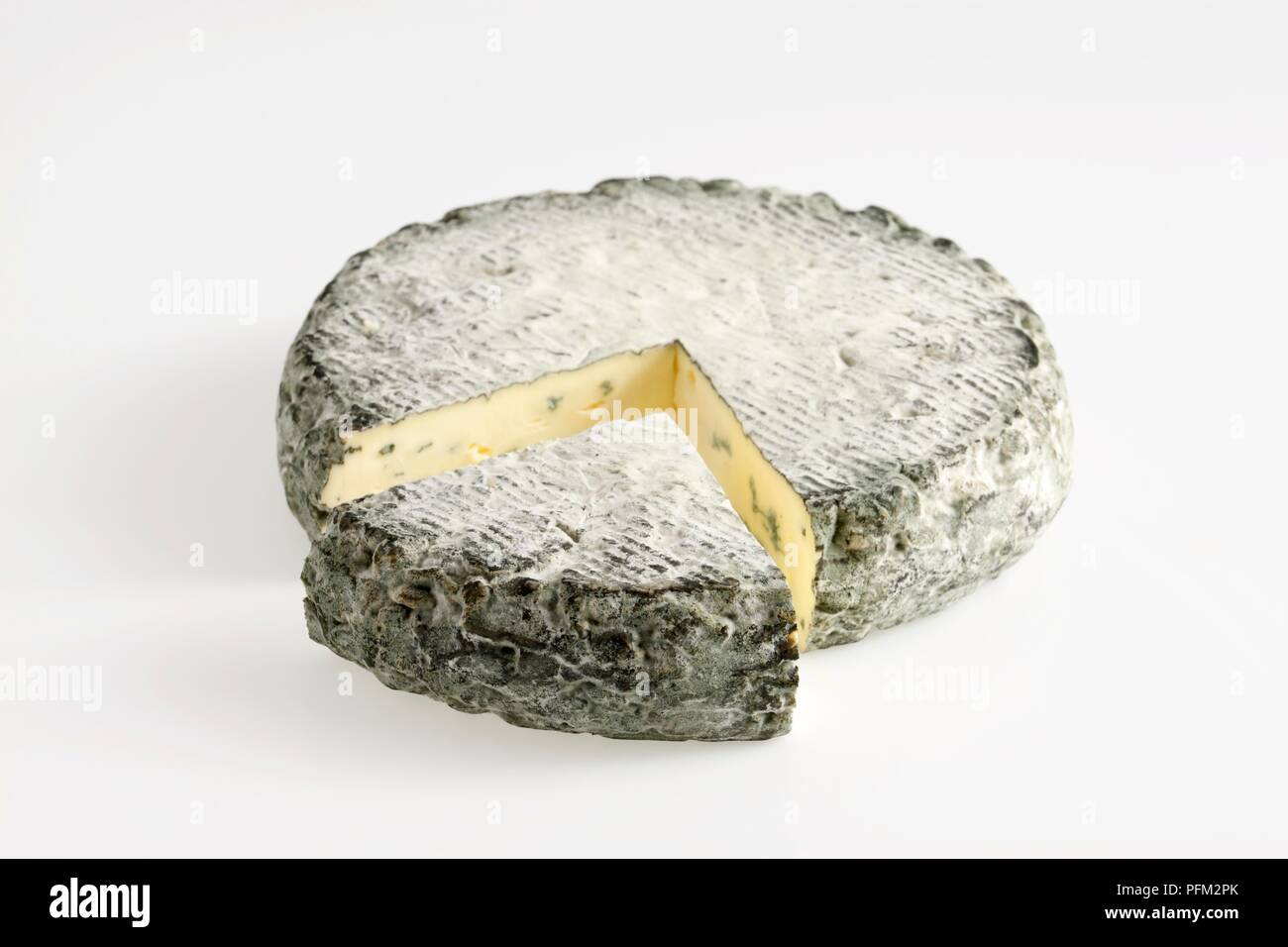 Cremeux de Puy, ash-coated cow's milk cheese with quarter slice cut ...