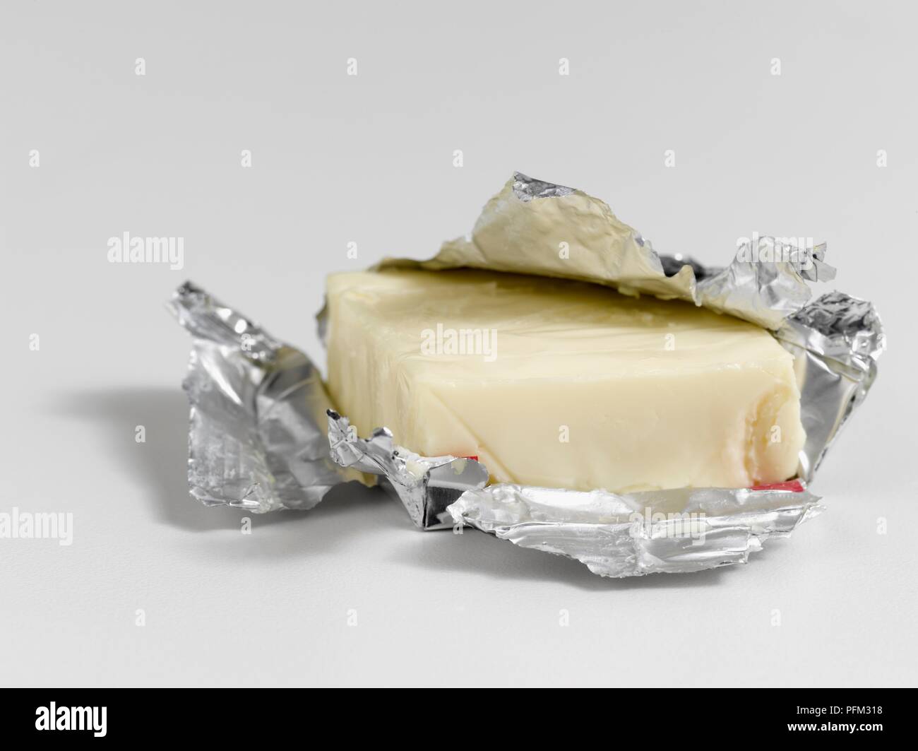 Foil wrapped cheese hi-res stock photography and images - Alamy