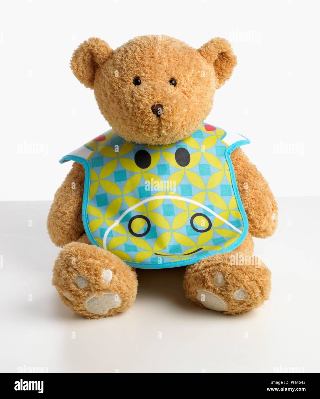 Soft toy wearing bib hi-res stock photography and images - Alamy