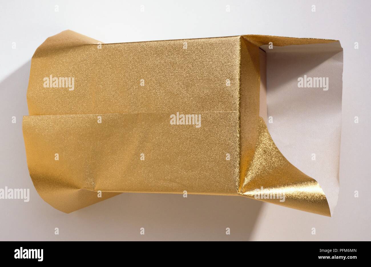 Gold wrapping hi-res stock photography and images - Alamy