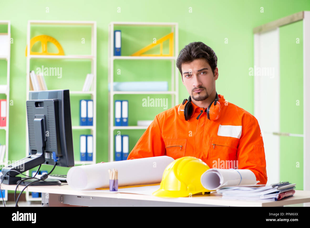 Construction supervisor planning new project in office Stock Photo - Alamy