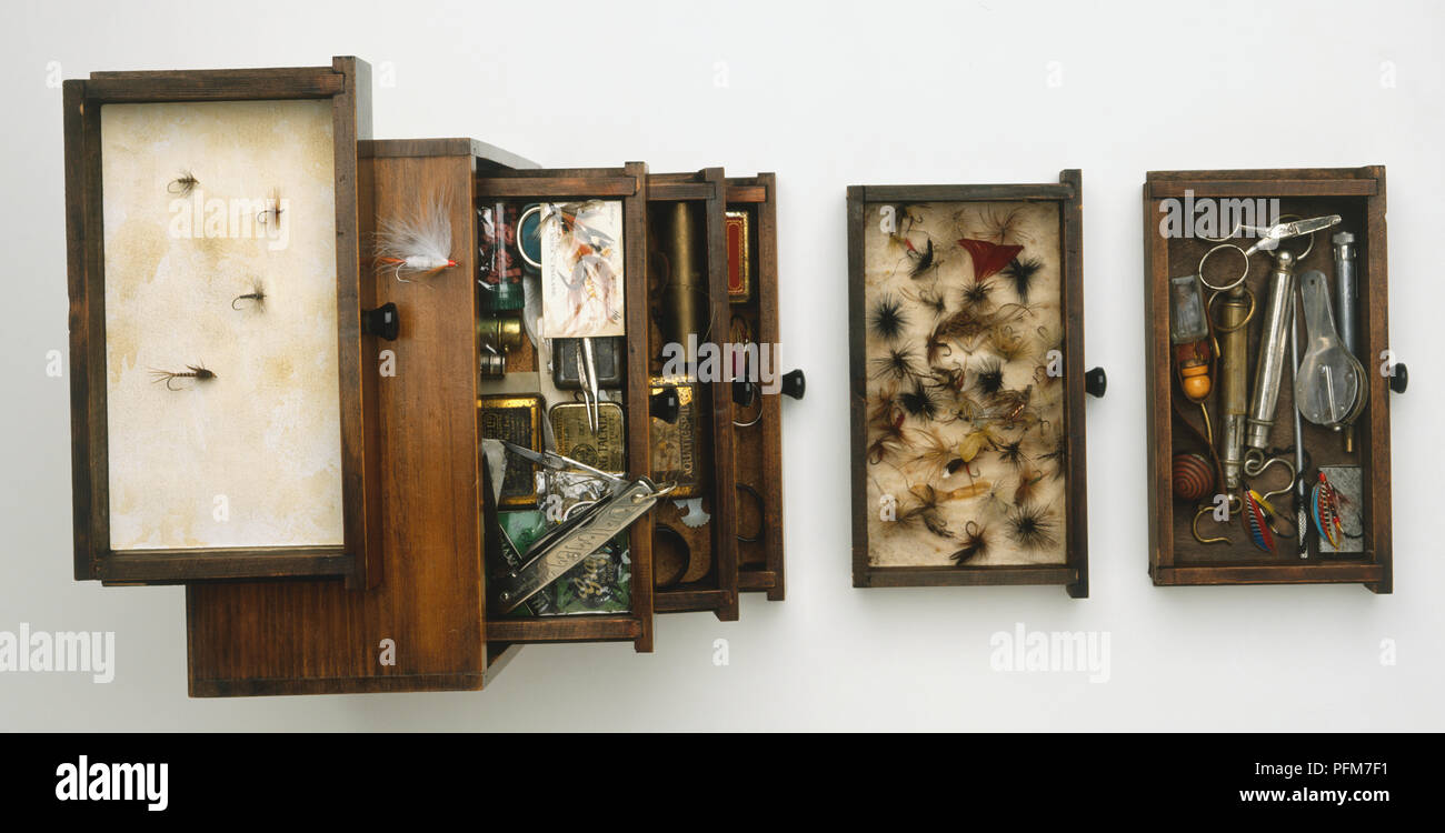 Antique fly box full of tools, view from above Stock Photo - Alamy