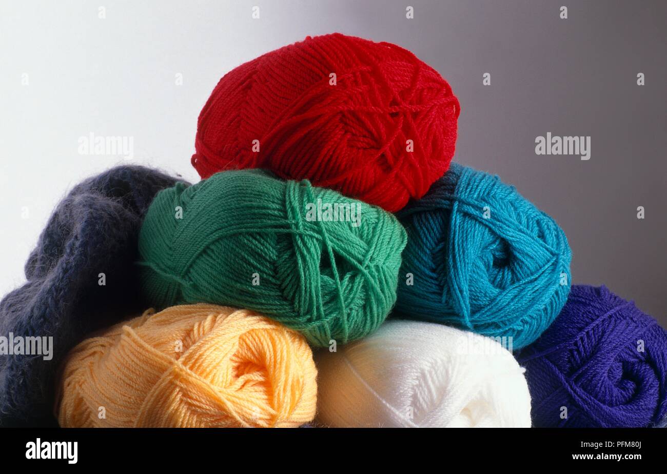 Pile of different coloured balls of wool Stock Photo - Alamy