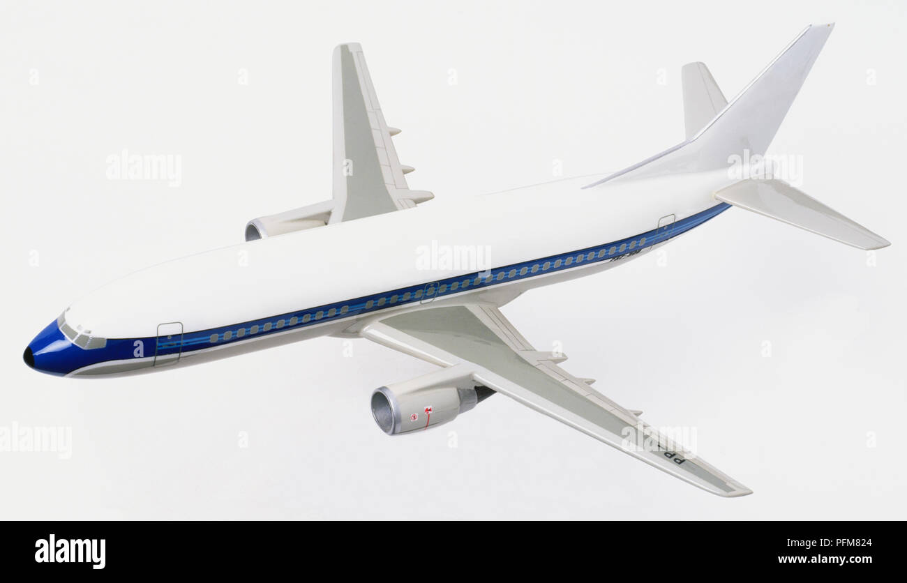 Model of a white and blue passenger aircraft, high angle side view ...