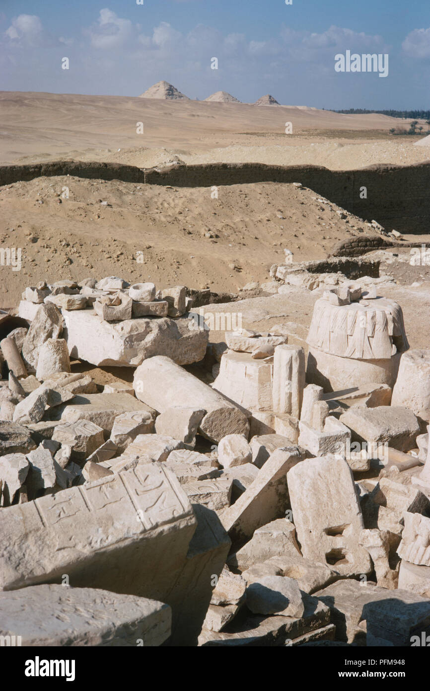 Egypt, Saqqara, ruins of temple with Abusir Pyramids in the distance ...