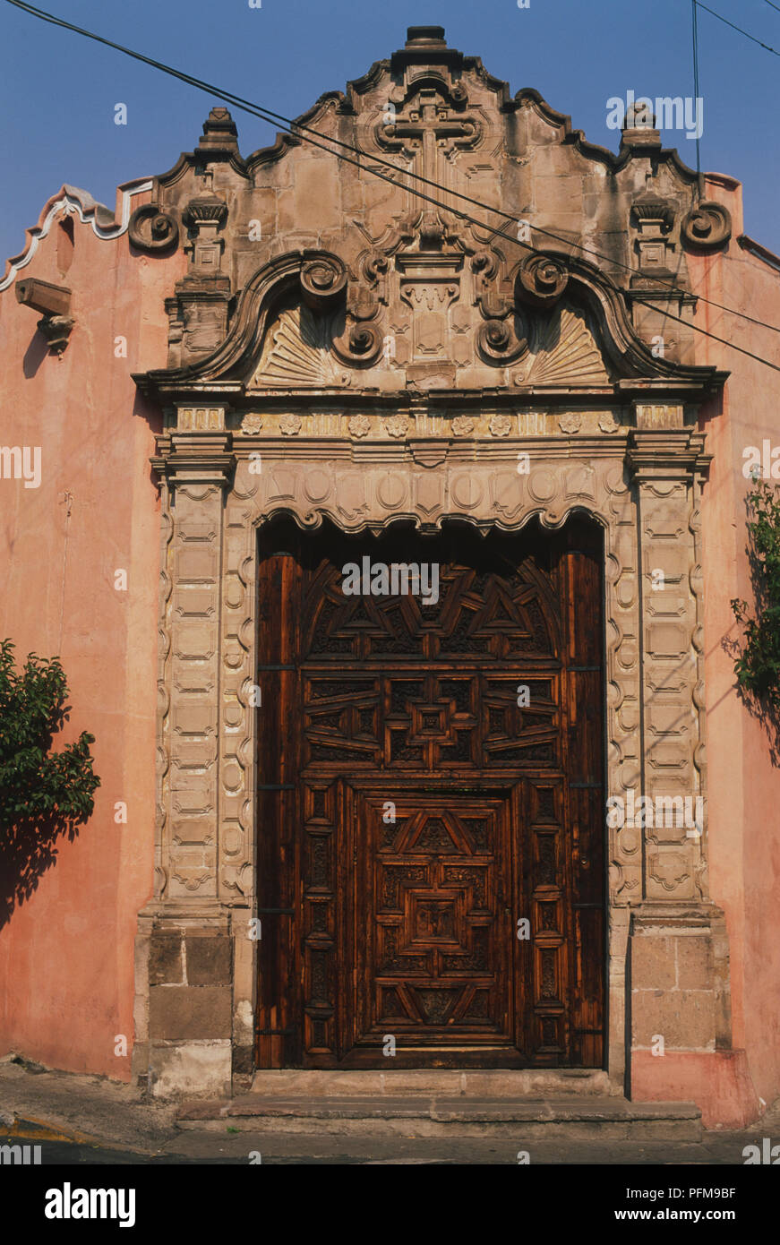 Mexico, Mexico City, Casa Chata, carved wooden door with ornate stone ...
