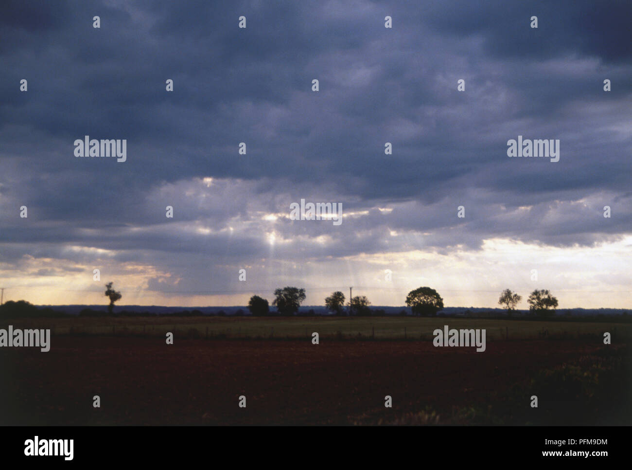 Stratocumulus, clouds characterised by large dark, rounded masses, sun ...