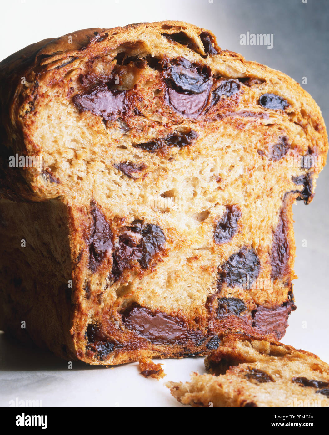 Loaf of Prune & Chocolate Bread with a slice removed showing the baked ...