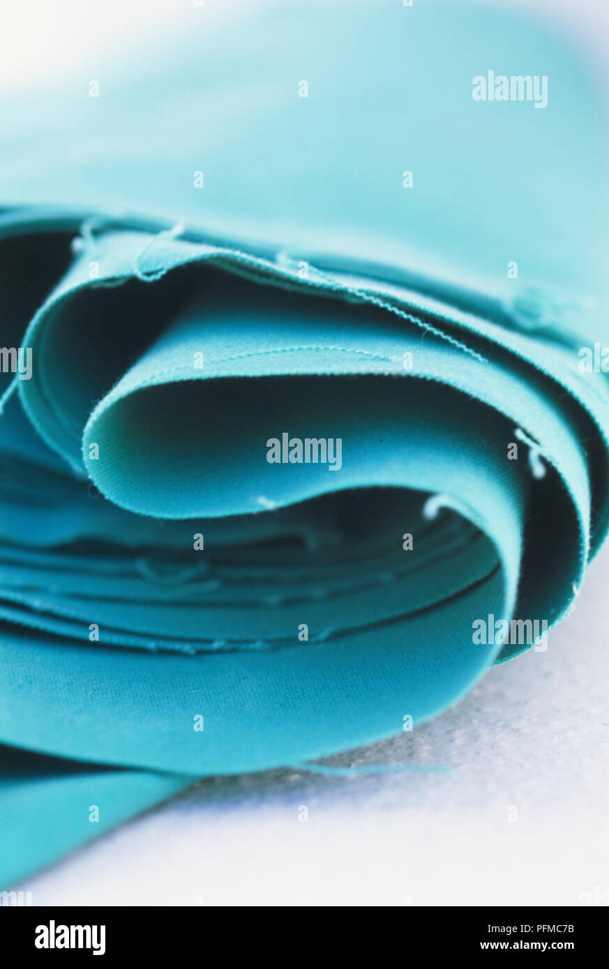 Turquoise fabric folds hi-res stock photography and images - Alamy