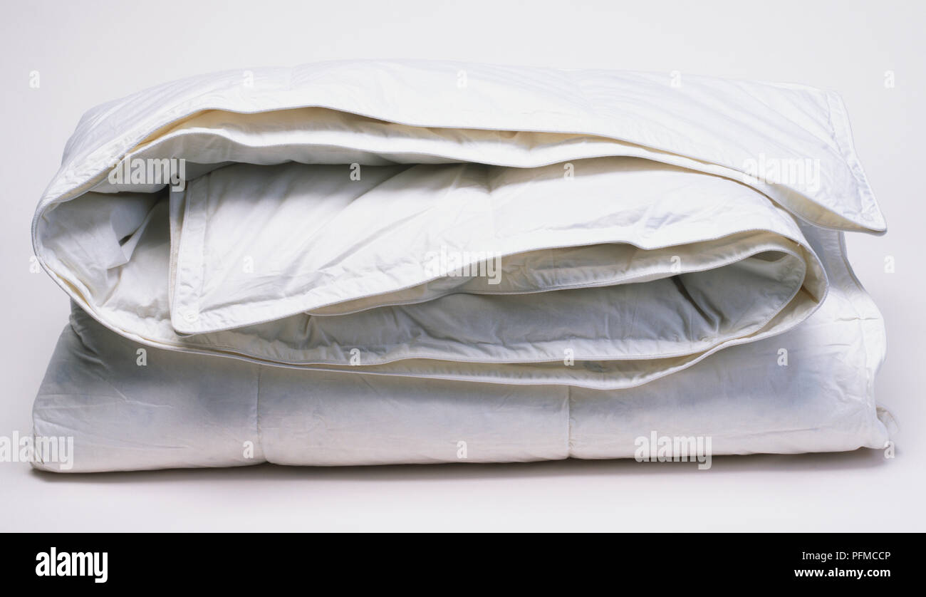 Bed covers folded hi-res stock photography and images - Alamy
