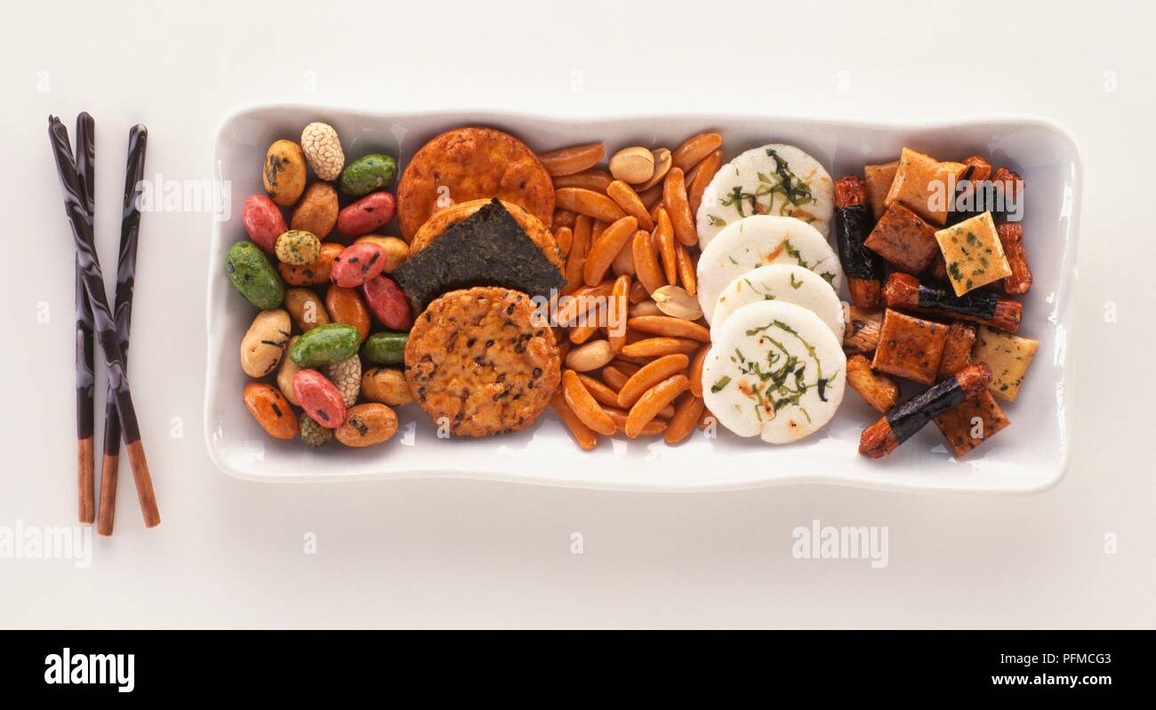 Japanese savoury snacks, including rice crackers, seaweed crackers, pea ...