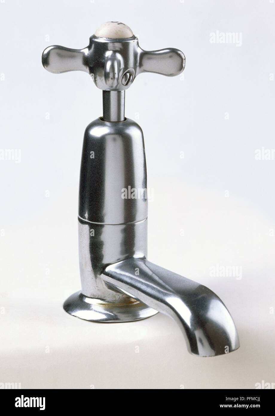 Chrome tap, simple classic design, angled front view Stock Photo - Alamy