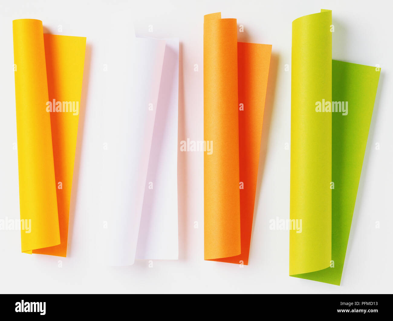 Coloured paper rolled into tubes Stock Photo - Alamy