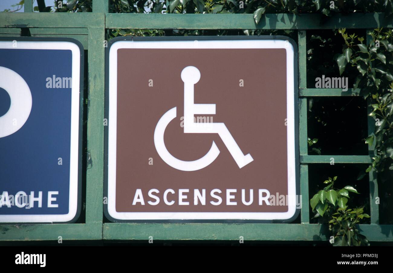 France, Paris, wheelchair accessibility sign Stock Photo - Alamy