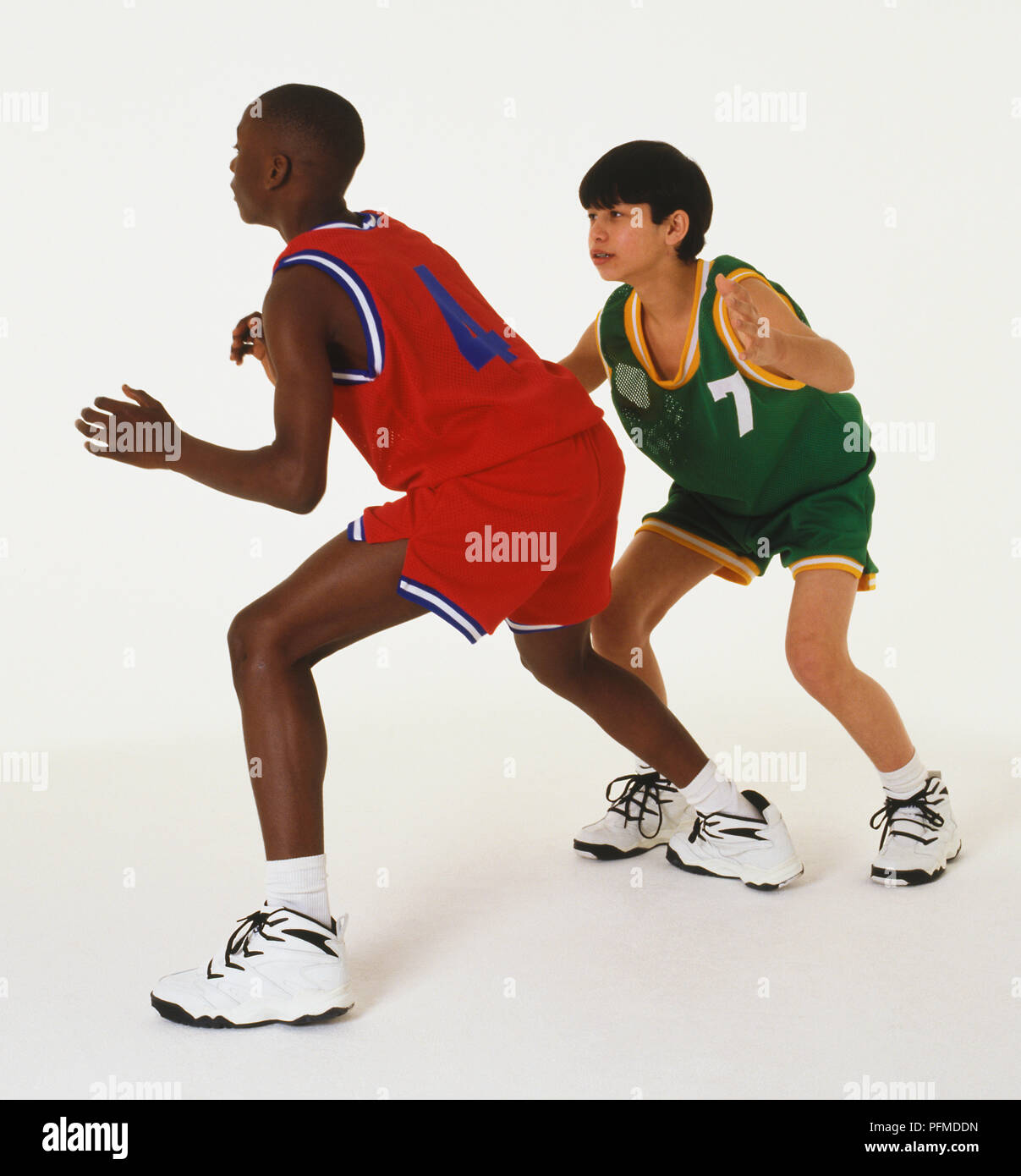 Receiver preparing to take ball, opponent preparing to intercept Stock ...