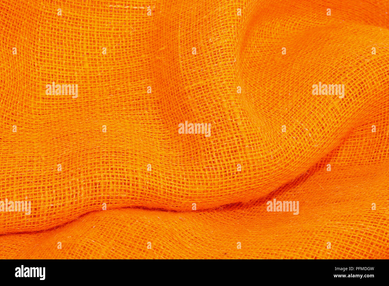 Orange wrinkled fabric hi-res stock photography and images - Alamy