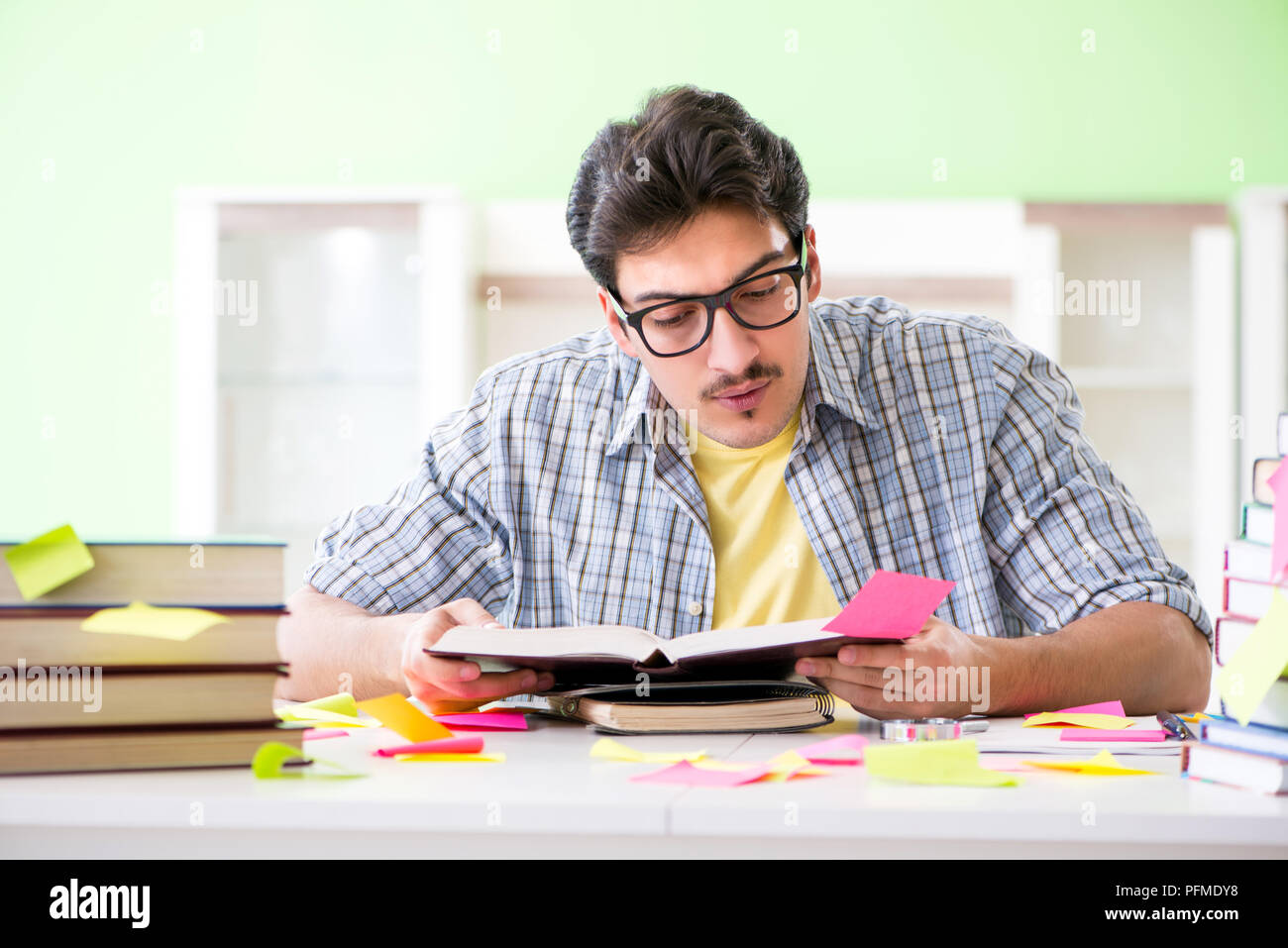 Student preparing for university exams with many conflicting priorities ...