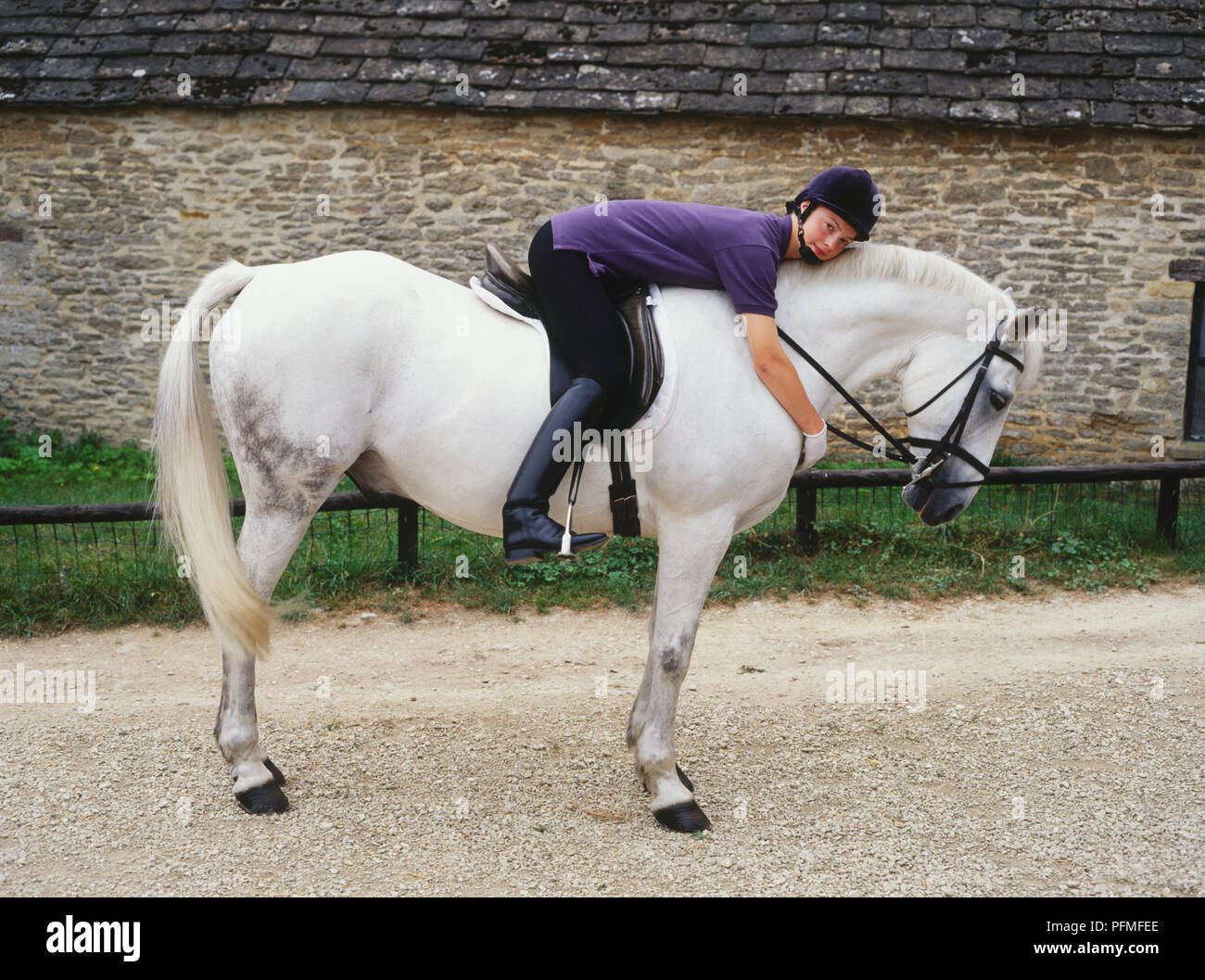 Girl hugging pony hi-res stock photography and images - Alamy